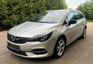 Grey Opel Astra 2021 in Vilnius, with an engine capacity of 1.50 L and mileage of 205 thousand km for 6700 €, photo  on AUTOMOTO.COM.LV