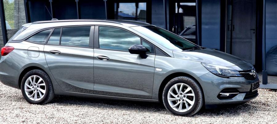 Grey Opel Astra 2022 in Kretinga, with an engine capacity of 1.50 L and mileage of 108 thousand km for 8999 €, photo 18 on AUTOMOTO.COM.LV