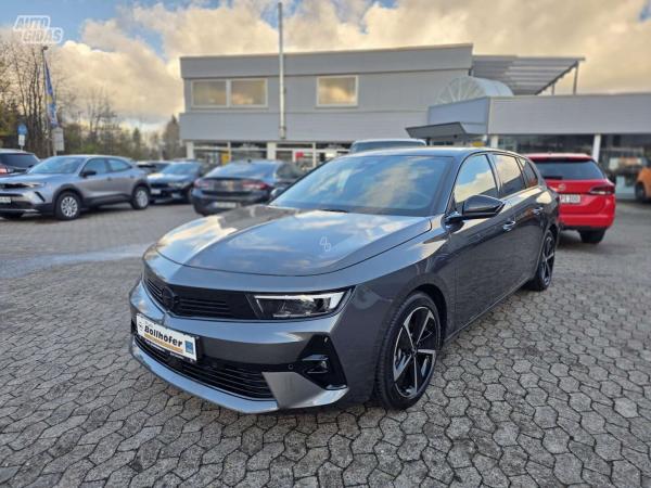 Grey Opel Astra 2024 in Kaunas, with an engine capacity of 1.20 L and mileage of 13 thousand km for 25351 €, photo 1 on AUTOMOTO.COM.LV