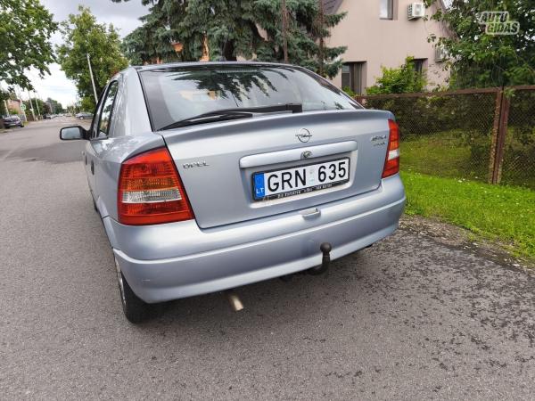 Opel Astra 2000 Kauņa, ar dzinēja tilpumu 2.00 L un nobraukumu 150 tūkst. km par 1000 €, foto 5 vietnē AUTOMOTO.COM.LV