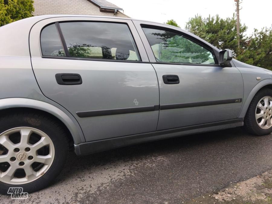 Opel Astra 2000 Kauņa, ar dzinēja tilpumu 2.00 L un nobraukumu 150 tūkst. km par 1000 €, foto 9 vietnē AUTOMOTO.COM.LV