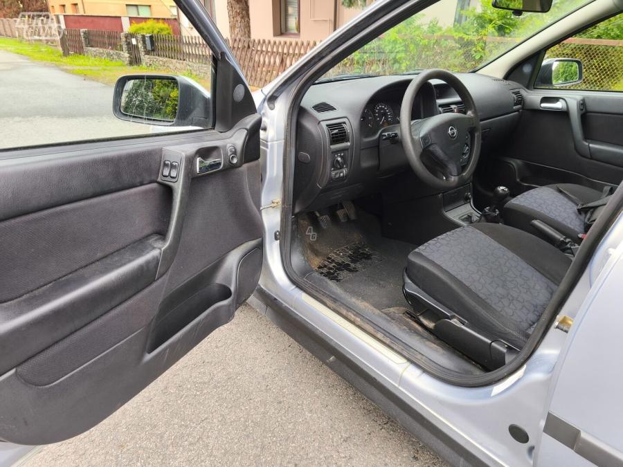 Opel Astra 2000 Kauņa, ar dzinēja tilpumu 2.00 L un nobraukumu 150 tūkst. km par 1000 €, foto 12 vietnē AUTOMOTO.COM.LV