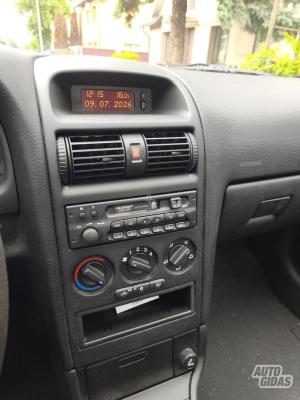 Opel Astra 2000 Kauņa, ar dzinēja tilpumu 2.00 L un nobraukumu 150 tūkst. km par 1000 €, foto 14 vietnē AUTOMOTO.COM.LV