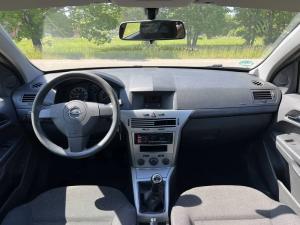 Opel Astra 2009 in Riga, with an engine capacity of 1.60 L and mileage of 215 thousand km for 3550 €, photo 14 on AUTOMOTO.COM.LV