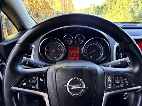 Opel Astra 2011 in Kaunas, with an engine capacity of 1.30 L and mileage of 111 thousand km for 1950 €, photo 9 on AUTOMOTO.COM.LV
