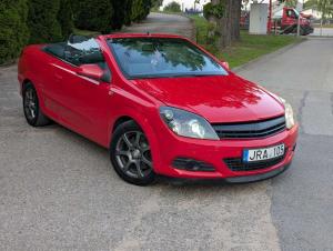 Red Opel Astra 2008 in Prienai, with an engine capacity of 1.90 L and mileage of 250 thousand km for 2150 €, photo 3 on AUTOMOTO.COM.LV
