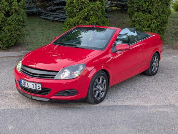 Red Opel Astra 2008 in Prienai, with an engine capacity of 1.90 L and mileage of 250 thousand km for 2150 €, photo 6 on AUTOMOTO.COM.LV