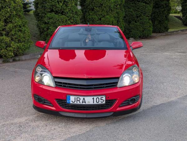Red Opel Astra 2008 in Prienai, with an engine capacity of 1.90 L and mileage of 250 thousand km for 2150 €, photo 7 on AUTOMOTO.COM.LV