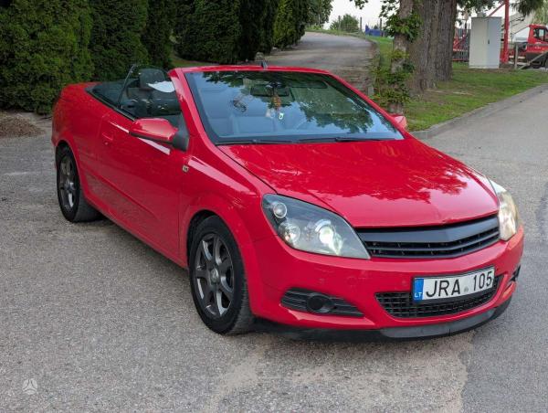 Red Opel Astra 2008 in Prienai, with an engine capacity of 1.90 L and mileage of 250 thousand km for 2150 €, photo 8 on AUTOMOTO.COM.LV
