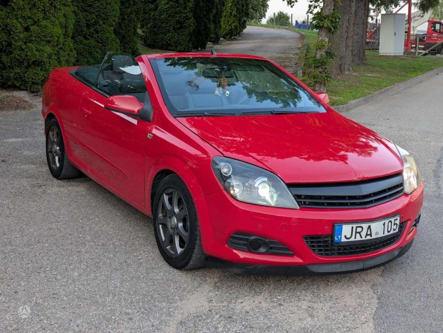 Red Opel Astra 2008 in Prienai, with an engine capacity of 1.90 L and mileage of 250 thousand km for 2150 €, photo 9 on AUTOMOTO.COM.LV