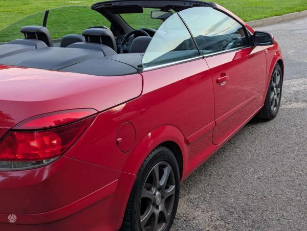 Red Opel Astra 2008 in Prienai, with an engine capacity of 1.90 L and mileage of 250 thousand km for 2150 €, photo 9 on AUTOMOTO.COM.LV