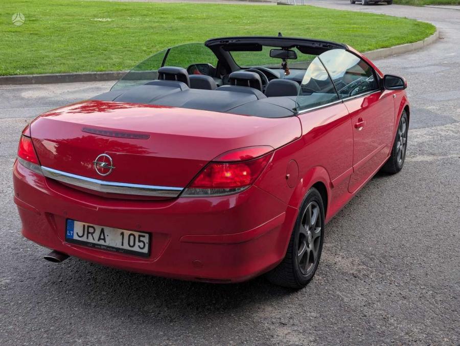 Red Opel Astra 2008 in Prienai, with an engine capacity of 1.90 L and mileage of 250 thousand km for 2150 €, photo 11 on AUTOMOTO.COM.LV