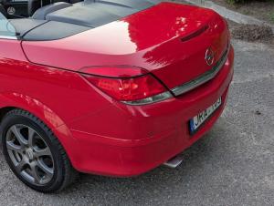 Red Opel Astra 2008 in Prienai, with an engine capacity of 1.90 L and mileage of 250 thousand km for 2150 €, photo 15 on AUTOMOTO.COM.LV