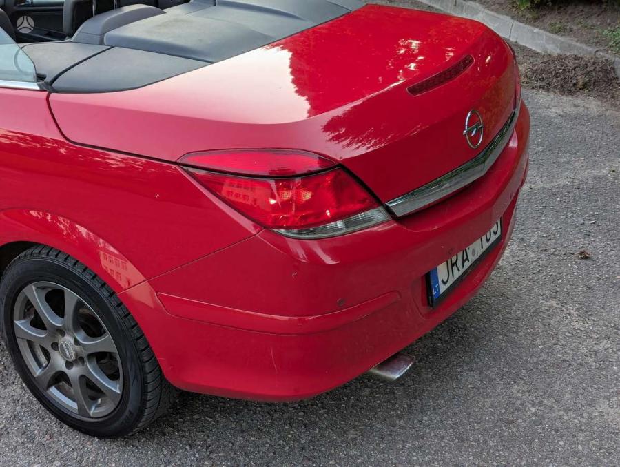 Red Opel Astra 2008 in Prienai, with an engine capacity of 1.90 L and mileage of 250 thousand km for 2150 €, photo 15 on AUTOMOTO.COM.LV