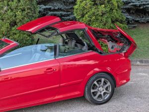 Red Opel Astra 2008 in Prienai, with an engine capacity of 1.90 L and mileage of 250 thousand km for 2150 €, photo 18 on AUTOMOTO.COM.LV