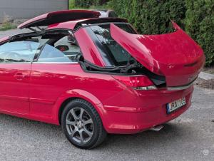 Red Opel Astra 2008 in Prienai, with an engine capacity of 1.90 L and mileage of 250 thousand km for 2150 €, photo 19 on AUTOMOTO.COM.LV
