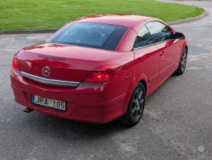 Red Opel Astra 2008 in Prienai, with an engine capacity of 1.90 L and mileage of 250 thousand km for 2150 €, photo 21 on AUTOMOTO.COM.LV