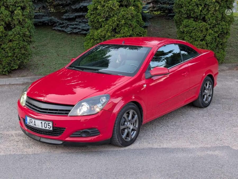 Red Opel Astra 2008 in Prienai, with an engine capacity of 1.90 L and mileage of 250 thousand km for 2150 €, photo 23 on AUTOMOTO.COM.LV