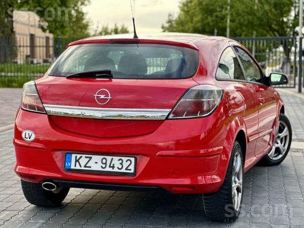 Red Opel Astra 2008 in Jelgava, with an engine capacity of 1.90 L and mileage of 246 thousand km for 540 €, photo 4 on AUTOMOTO.COM.LV