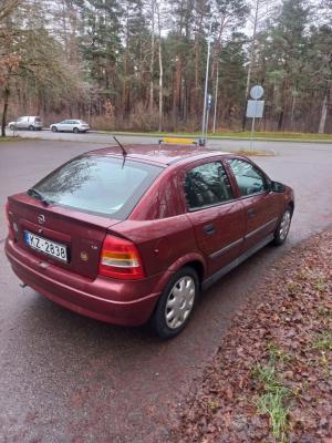 Red Opel Astra 1998 in Riga, with an engine capacity of 1.60 L and mileage of 215 thousand km for 849 €, photo 2 on AUTOMOTO.COM.LV