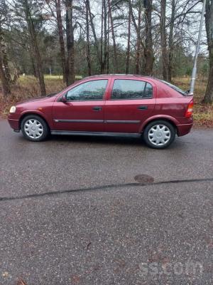 Red Opel Astra 1998 in Riga, with an engine capacity of 1.60 L and mileage of 215 thousand km for 849 €, photo 5 on AUTOMOTO.COM.LV