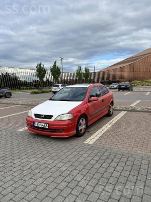 Red Opel Astra 1998 in Ventspils, with an engine capacity of 1.70 L and mileage of 351 thousand km for 500 €, photo  on AUTOMOTO.COM.LV