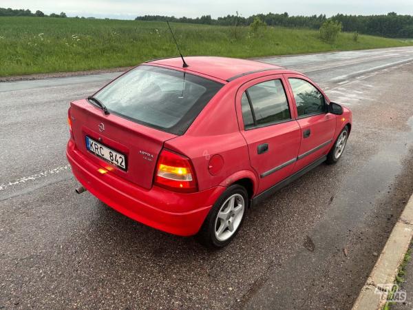 Red Opel Astra 1999 in Joniskis, with an engine capacity of 1.60 L and mileage of 236 thousand km for 530 €, photo 7 on AUTOMOTO.COM.LV