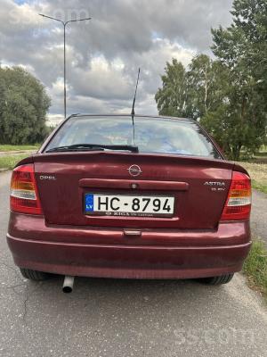 Red Opel Astra 1999 in Riga, with an engine capacity of 1.60 L and mileage of 330 thousand km for 900 €, photo 4 on AUTOMOTO.COM.LV