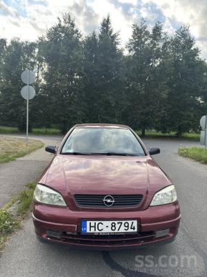 Red Opel Astra 1999 in Riga, with an engine capacity of 1.60 L and mileage of 330 thousand km for 900 €, photo 5 on AUTOMOTO.COM.LV