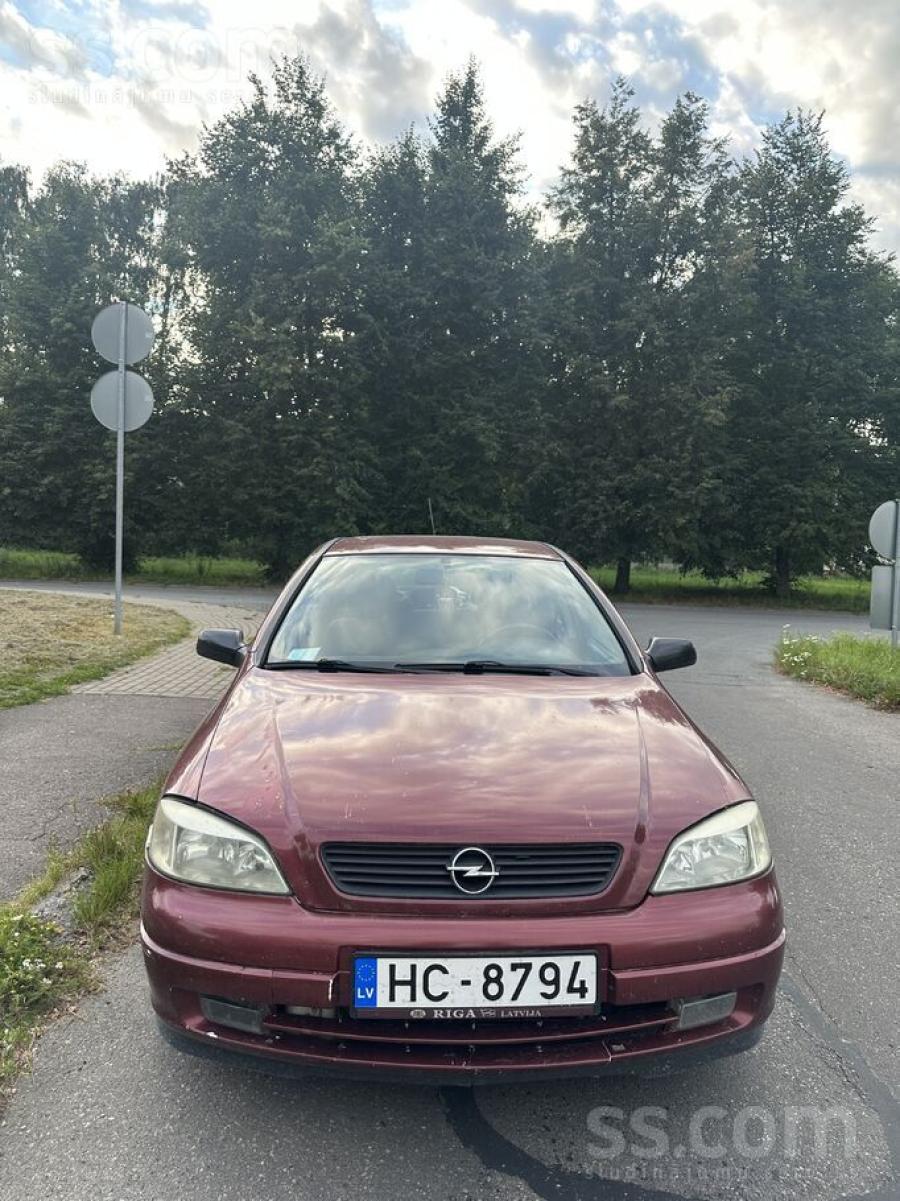 Red Opel Astra 1999 in Riga, with an engine capacity of 1.60 L and mileage of 330 thousand km for 900 €, photo 5 on AUTOMOTO.COM.LV