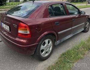 Red Opel Astra 1999 in Riga, with an engine capacity of 1.60 L and mileage of 330 thousand km for 900 €, photo 6 on AUTOMOTO.COM.LV