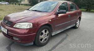 Red Opel Astra 1999 in Riga, with an engine capacity of 1.60 L and mileage of 330 thousand km for 900 €, photo 7 on AUTOMOTO.COM.LV