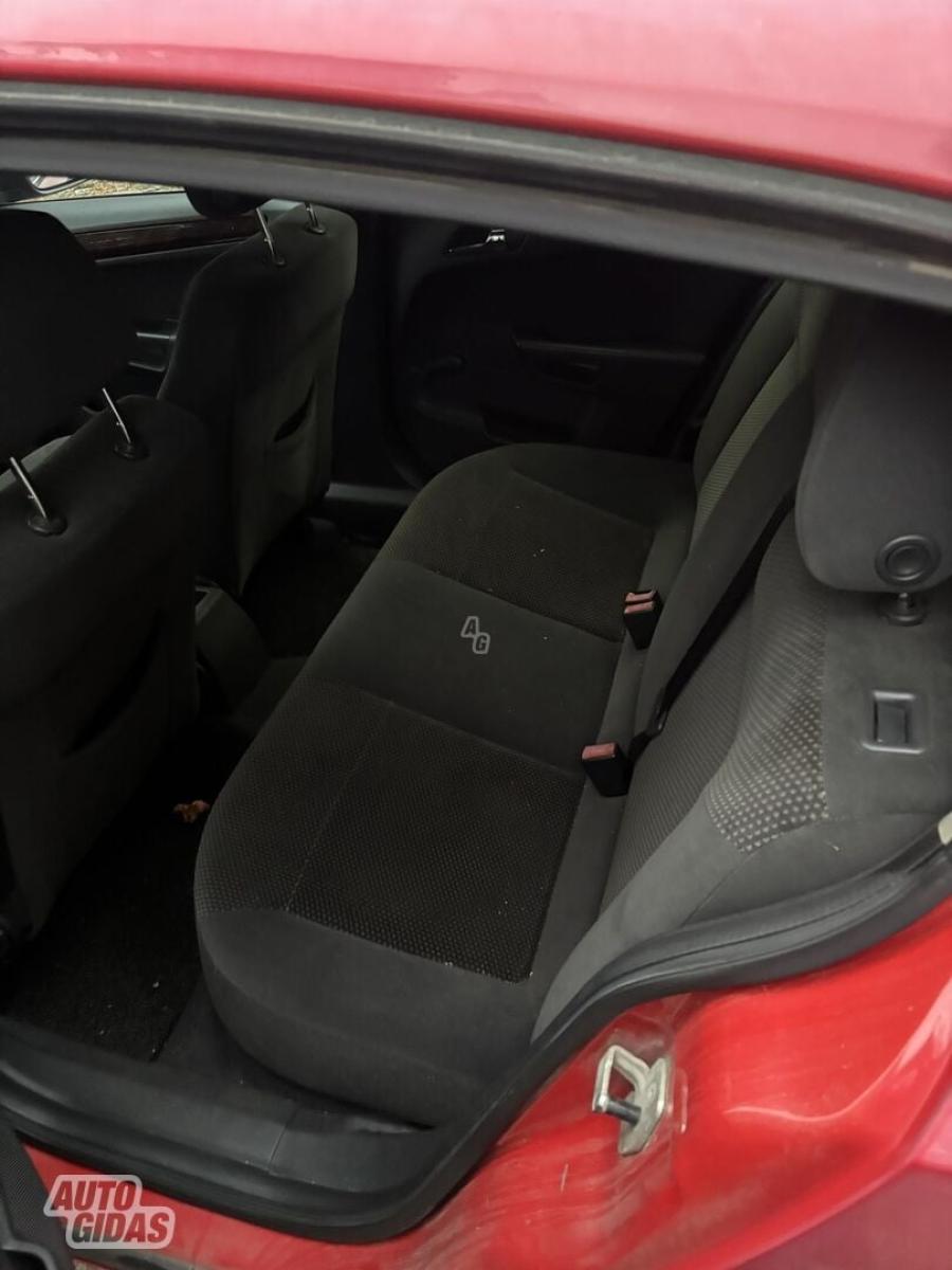 Sarkans Opel Astra 2004 Joniškis, ar dzinēja tilpumu 1.70 L un nobraukumu 292 tūkst. km par 520 €, foto 10 vietnē AUTOMOTO.COM.LV