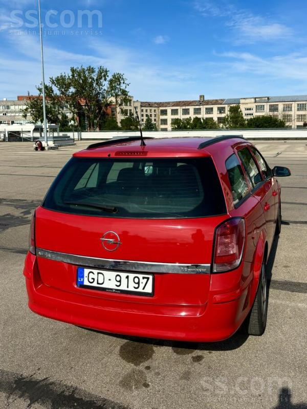 Sarkans Opel Astra 2006 Rīga, ar dzinēja tilpumu 1.60 L un nobraukumu 210 tūkst. km par 1400 €, foto 2 vietnē AUTOMOTO.COM.LV