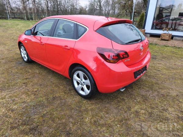 Red Opel Astra 2010 in Kuldiga, with an engine capacity of 1.40 L and mileage of 160 thousand km for 4850 €, photo 4 on AUTOMOTO.COM.LV
