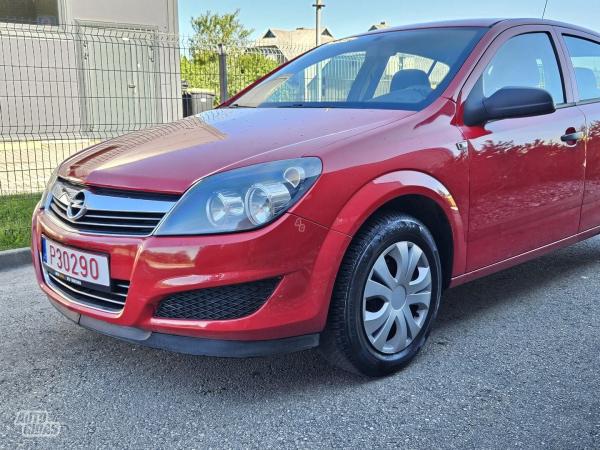 Red Opel Astra 2010 in Kluonaliai, with an engine capacity of 1.40 L and mileage of 265 thousand km for 2150 €, photo 7 on AUTOMOTO.COM.LV