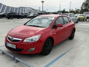 Red Opel Astra 2010 in Riga, with an engine capacity of 1.40 L and mileage of 124 thousand km for 2500 €, photo  on AUTOMOTO.COM.LV