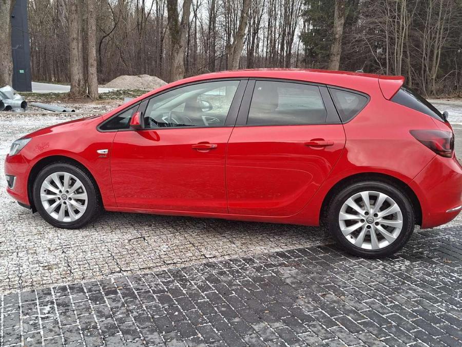Red Opel Astra 2013 in Kaunas, with an engine capacity of 1.69 L and mileage of 249 thousand km for 4200 €, photo 14 on AUTOMOTO.COM.LV