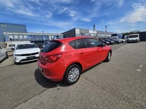 Red Opel Astra 2015 in Kaunas, with an engine capacity of 1.60 L and mileage of 273 thousand km for 3155 €, photo 17 on AUTOMOTO.COM.LV