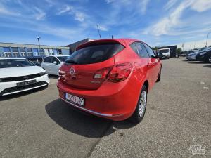 Red Opel Astra 2015 in Kaunas, with an engine capacity of 1.60 L and mileage of 273 thousand km for 3155 €, photo 19 on AUTOMOTO.COM.LV