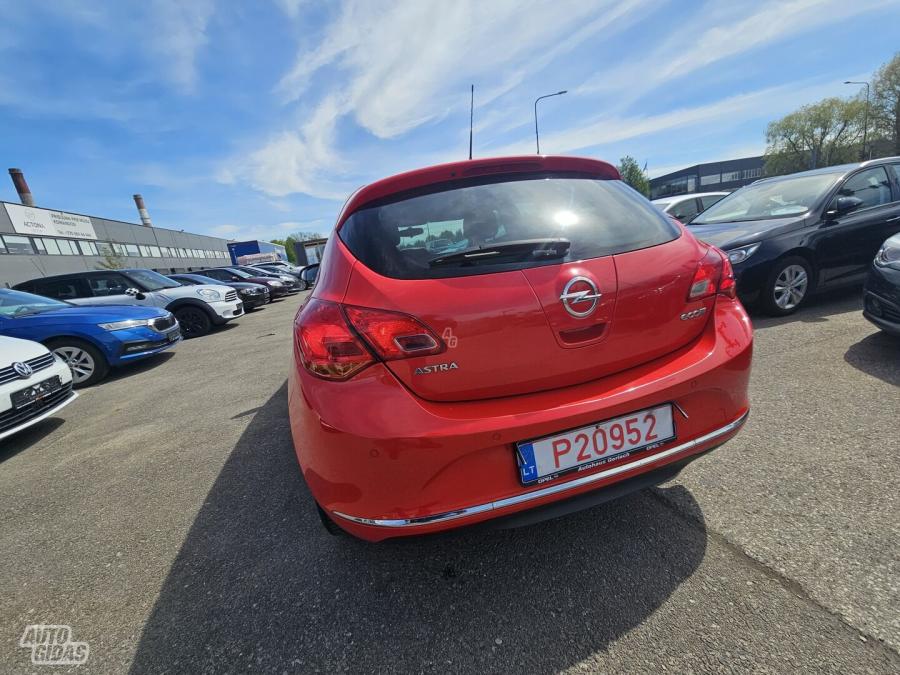 Red Opel Astra 2015 in Kaunas, with an engine capacity of 1.60 L and mileage of 273 thousand km for 3155 €, photo 21 on AUTOMOTO.COM.LV