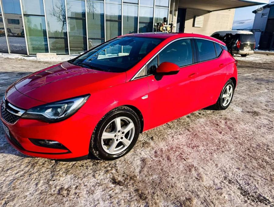 Red Opel Astra 2016 in Siauliai, with an engine capacity of 1.60 L and mileage of 173 thousand km for 6950 €, photo 1 on AUTOMOTO.COM.LV