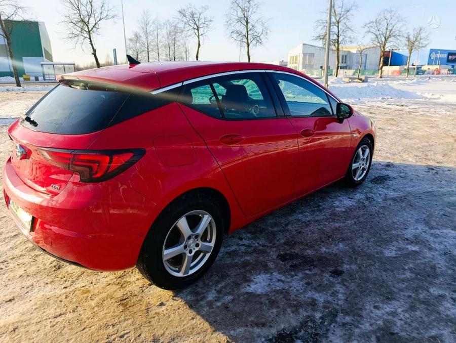 Red Opel Astra 2016 in Siauliai, with an engine capacity of 1.60 L and mileage of 173 thousand km for 6950 €, photo 5 on AUTOMOTO.COM.LV