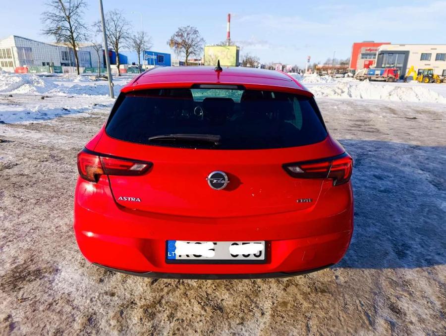 Red Opel Astra 2016 in Siauliai, with an engine capacity of 1.60 L and mileage of 173 thousand km for 6950 €, photo 6 on AUTOMOTO.COM.LV