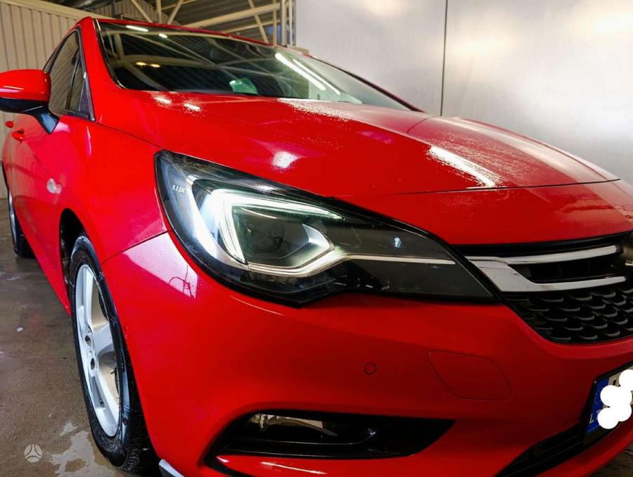 Red Opel Astra 2016 in Siauliai, with an engine capacity of 1.60 L and mileage of 173 thousand km for 6950 €, photo 7 on AUTOMOTO.COM.LV