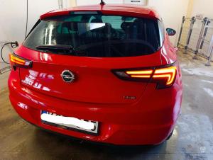 Red Opel Astra 2016 in Siauliai, with an engine capacity of 1.60 L and mileage of 173 thousand km for 6950 €, photo 8 on AUTOMOTO.COM.LV