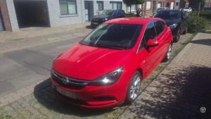 Red Opel Astra 2016 in Siauliai, with an engine capacity of 1.60 L and mileage of 191 thousand km for 4999 €, photo  on AUTOMOTO.COM.LV