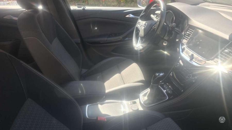 Red Opel Astra 2016 in Siauliai, with an engine capacity of 1.60 L and mileage of 191 thousand km for 4999 €, photo 8 on AUTOMOTO.COM.LV