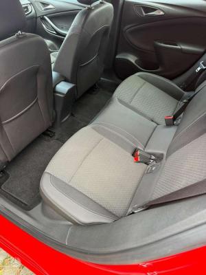 Red Opel Astra 2016 in Siauliai, with an engine capacity of 1.60 L and mileage of 191 thousand km for 4999 €, photo 14 on AUTOMOTO.COM.LV