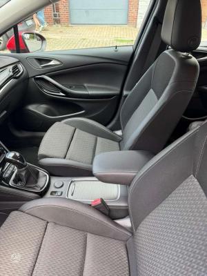 Red Opel Astra 2016 in Siauliai, with an engine capacity of 1.60 L and mileage of 191 thousand km for 4999 €, photo 16 on AUTOMOTO.COM.LV